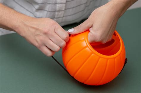 Creative Ways To Use Plastic Pumpkins For Halloween Decor Hgtv