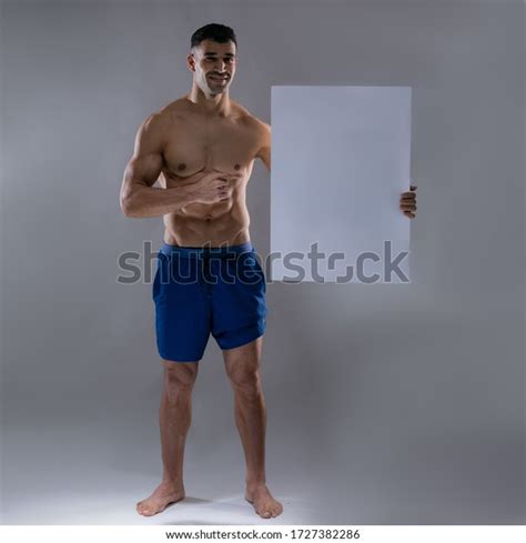 Sexy Man Holding Copy Space Blank Stock Photo 1727382286 Shutterstock