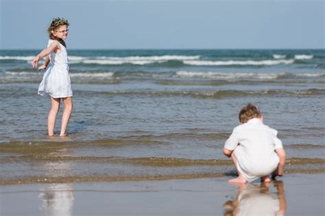 Free Photo Brother And Sister Enjoying A Beach