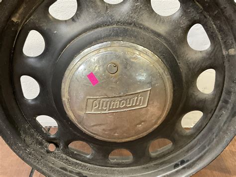 Lot 2 Plymouth Hubcap And Rim