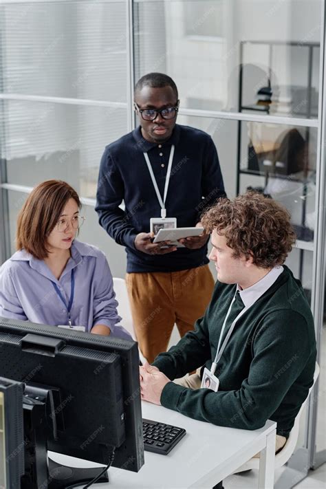 Premium Photo Team Of Developers Working With Computer Program