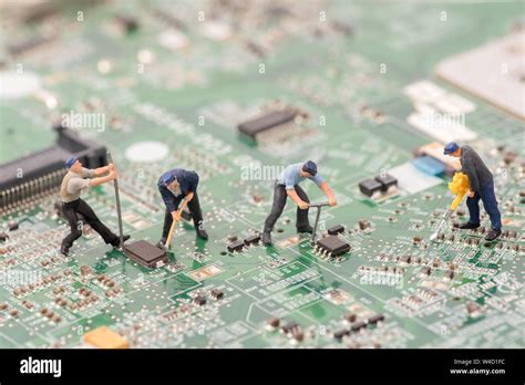 Miniature People Repair Cpu Board Teamwork And Technology Concept Stock Photo Alamy