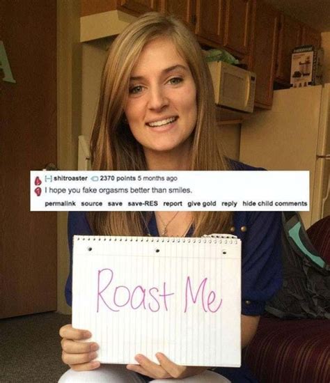 A Woman Holding Up A Sign With The Words Roast Me Written On It In Front Of Her Face