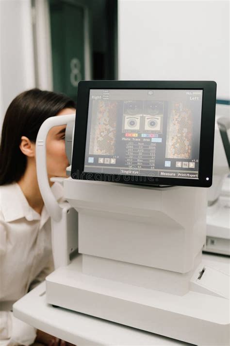Girl Undergoes An Oct Eye Exam Using Advanced Optical Coherence Tomography Equipment The High