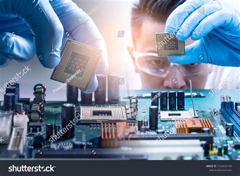 Asian Technician Putting Cpu On Socket Stock Photo Shutterstock
