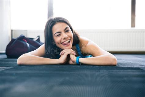 Woman Lying On The Floor And Showing Her Tongue Stock Image Image Of