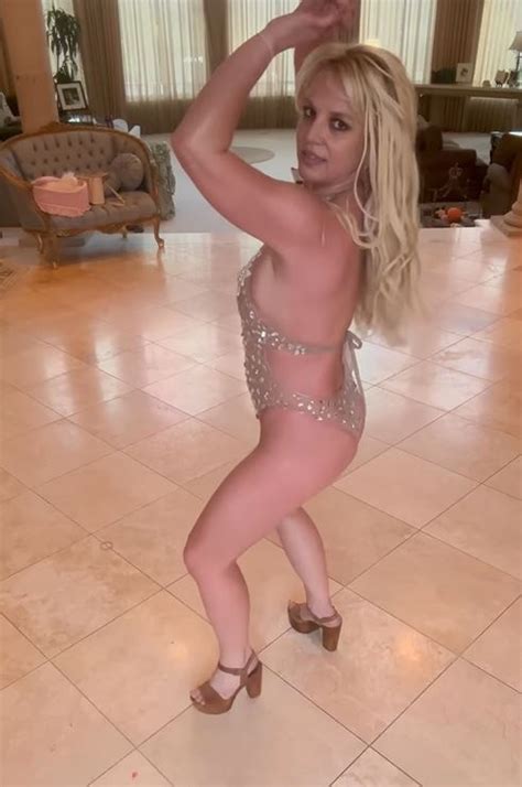 Britney Spears Strips Down To A See Through Thong Bodysuit And Dances