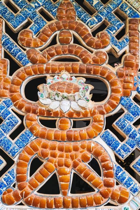 A Pattern And A Lotus Flower Made Of Small Ceramic Tiles Stock Image