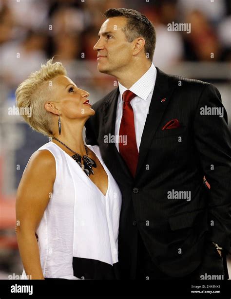 Former Arizona Cardinals Quarterback Kurt Warner And His Wife Brenda Warner Left Stand On The