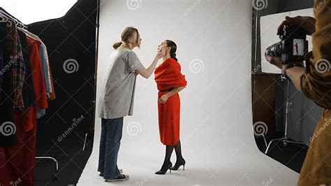 Backstage Of Model And Professional Team In The Studio Assistant Girl