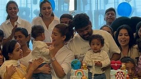 Vignesh Shivan Nayanthara Cant Stop Smiling As They Hold Twins Uyir Ulag Celebrate Birthday