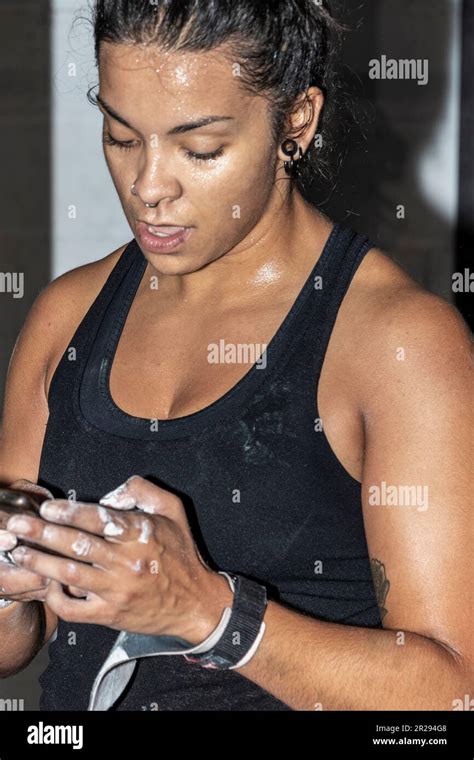 Woman Engages In Fitness Routine While Staying Connected With Mobile