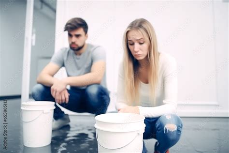 There Is A Flood In The Apartment Water Is Dripping From The Roof Into Buckets Upset Babe