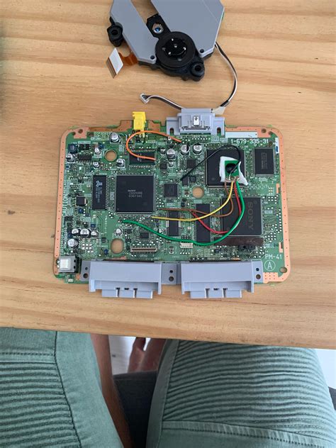 Just Opened Up My Psone And I Saw This Is It A Modchip Or Is It Part Of The Console