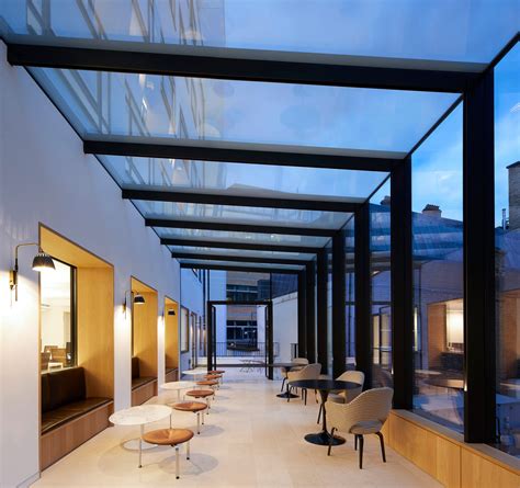 piercy and company suspends staircase in new atrium of savile row office