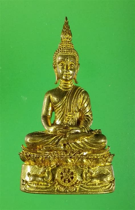 พระกริ่งนฤมิตรโชค เนื้อทองทิพย์ พิมพ์ใหญ่ หลวงพ่อจรัญ วัดอัมพวัน ปี 2554 เลข 4334 พระเครื่อง พระ