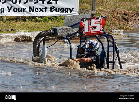 Swamp Buggy Moving Through Water Action Half Submerged Jeep Style