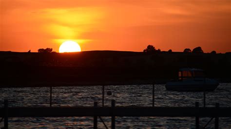 Analysis Of A Group Sequential Trial With A Survival Endpoint Using