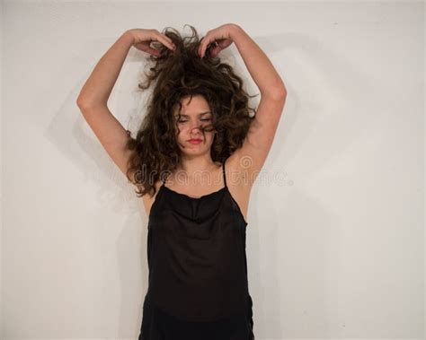 Seen Very Girl With Long Brown Wavy Hair In Black Dress With Straps