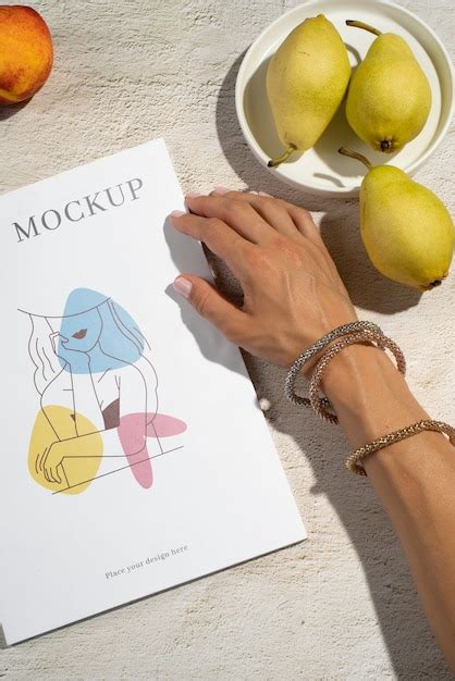 Premium Psd Flat Lay Model Holding Magazine