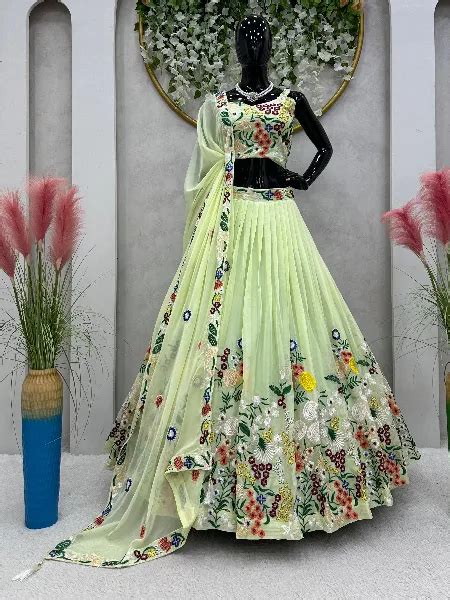 Light Yellow Color Lehenga Choli With Heavy Colorful Embroidery Work In