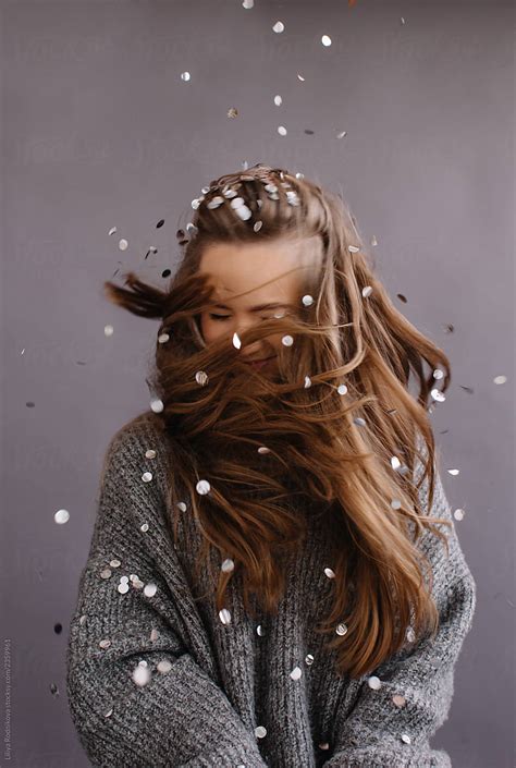 Happy Woman With Long Hair With Silver Confetti By Stocksy Contributor Liliya Rodnikova