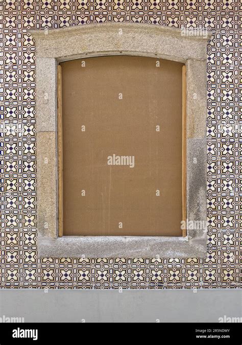 Traditional Portugal House Facade With With Wood Panel On Window Frame