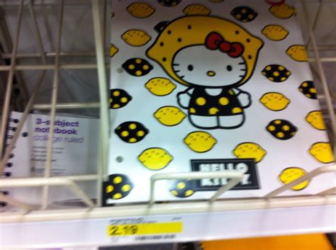 Hello Kitty Sticker On Bookshelf