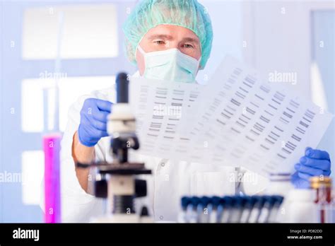Scientist Analizing DNA Sequence Stock Photo Alamy