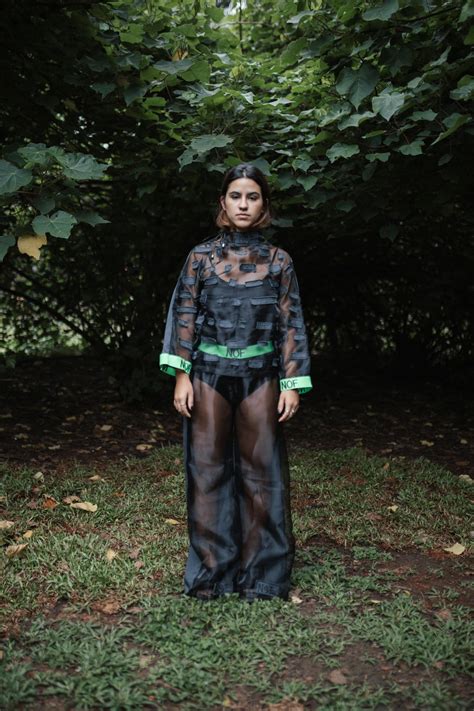 Redhead Model Wearing Silicone Nipple Covers To See Through Turtleneck