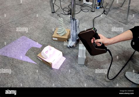 3d Scanning Working Portable 3d Scanner Man Scanning An Object With A