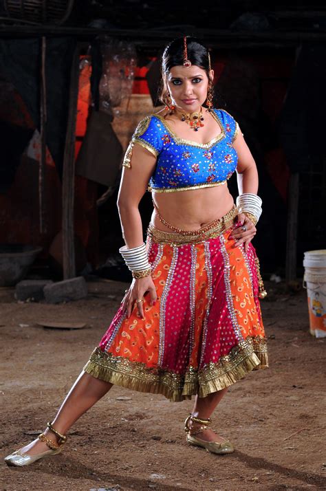 Beauty Galore HD Madhu Sharma Hot Item Song Photos In Ghagra Choli Bhojpuri Movie Scenes
