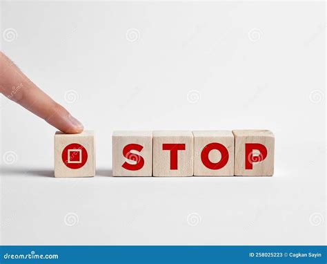 Finger Presses The Pause Button On Wooden Cubes Stock Image Image Of