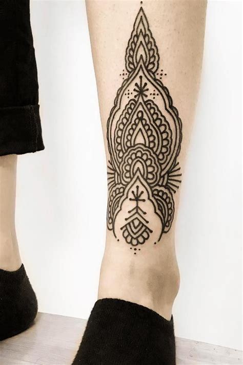 Unveiling The Beauty Of Mandala Tattoo Symbolism And Significance Faq Geometric Tattoo