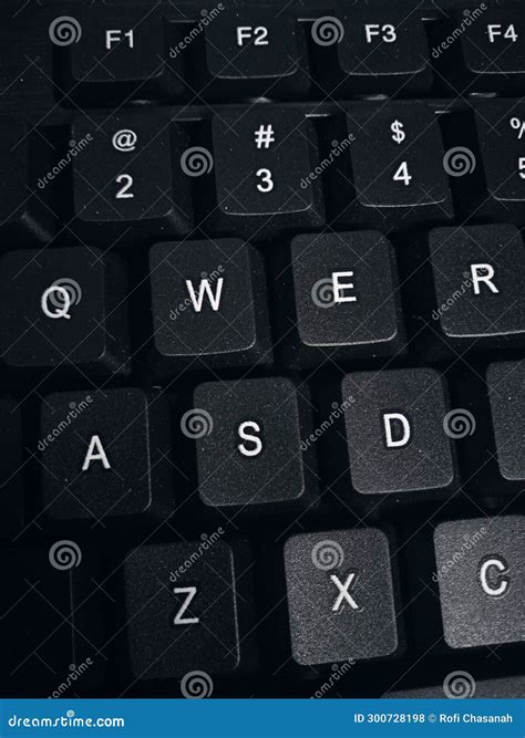 The Keyboard Is Black And You Can See The Letters And Numbers Stock