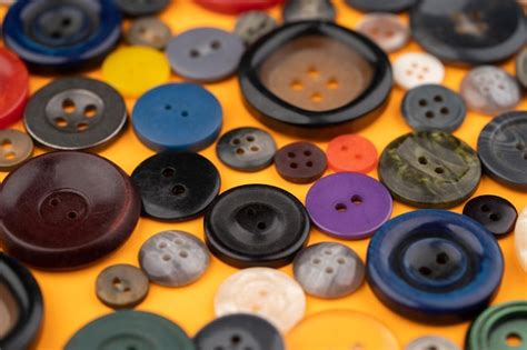 Premium Photo Many Different Buttons On A Yellow Background