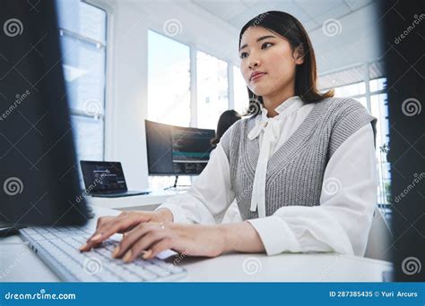Asian Woman Computer And Coding In Software Development Or Web Design At The Office Female