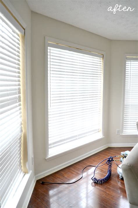 Adding Trim To The Living Room Windows Ugly Duckling House