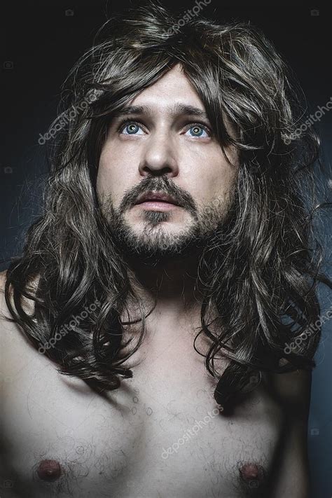 Naked Man With Big Brown Hair Looking At Camera Stock Photo By