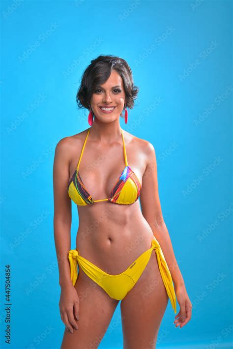 Professional Photo Woman In Yellow Bikini Blue Background Brazilian