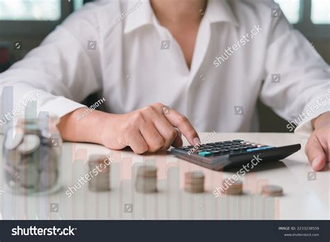 Businessman Using Calculator Calculate Stacking Coins Stock Photo Shutterstock