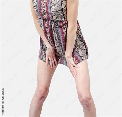 Young Woman In A Dress Body Legs Stands In A Sexy Pose Spreading