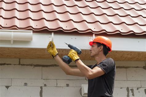 Installation Of Gutter System Stock Image Image Of Drain Roofing 96841565