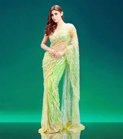 Mouni Roy Goes Majestic Beyond Words In A Neon Sheer Saree With