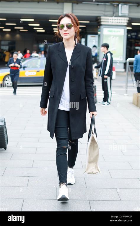 Chinese Actress Huang Mengying Or Maggie Huang Arrives At The Beijing Capital International