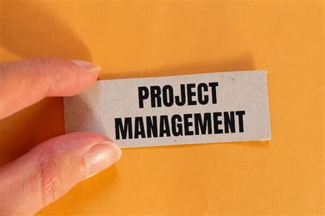 Premium Photo Project Management Message Written On Ripped Paper