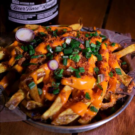 Papas Antítesis Cheddar Panceta Y Verdeo