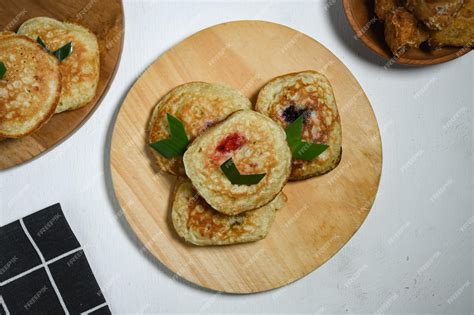 Premium Photo Top View Kue Khamir Or Khamir Cake On Wooden Plate Khamir Cake Is A Traditional