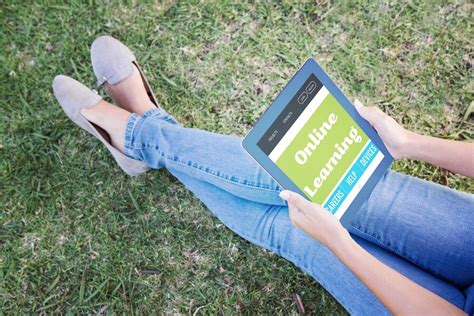 Premium Photo Online Learning Interface Against Woman Using Tablet In