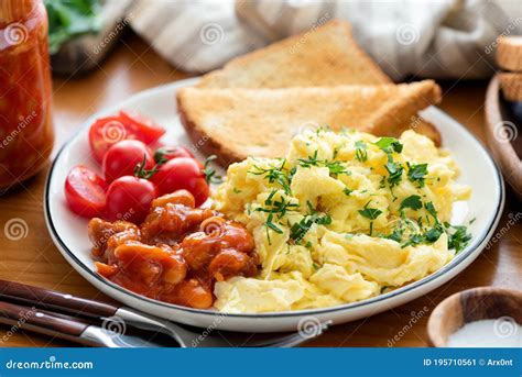 Scrambled Eggs Toasted Bread And Baked Beans Stock Image Image Of